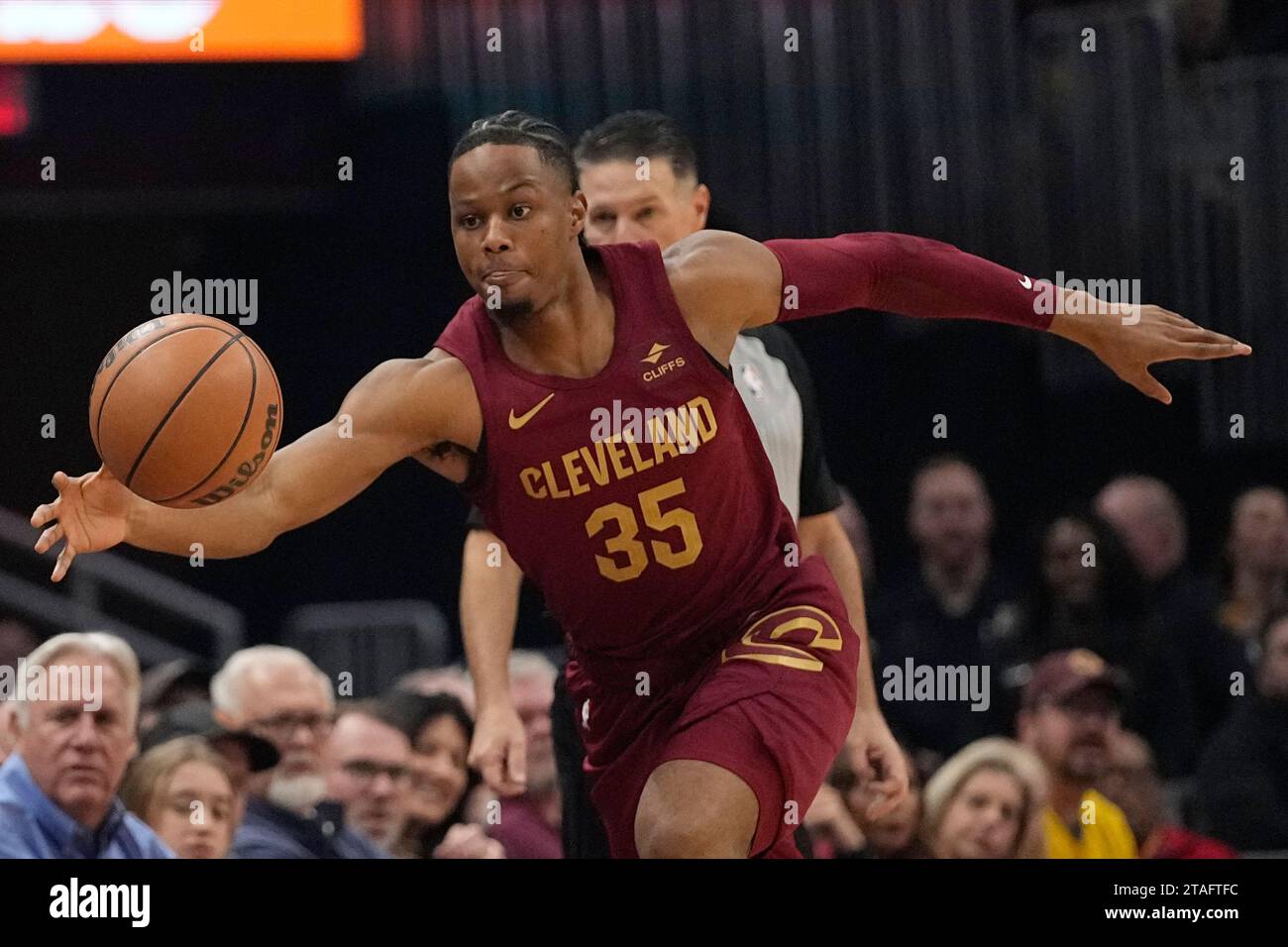 Cleveland Cavaliers forward Isaac Okoro (35) attempts to keep the ball ...