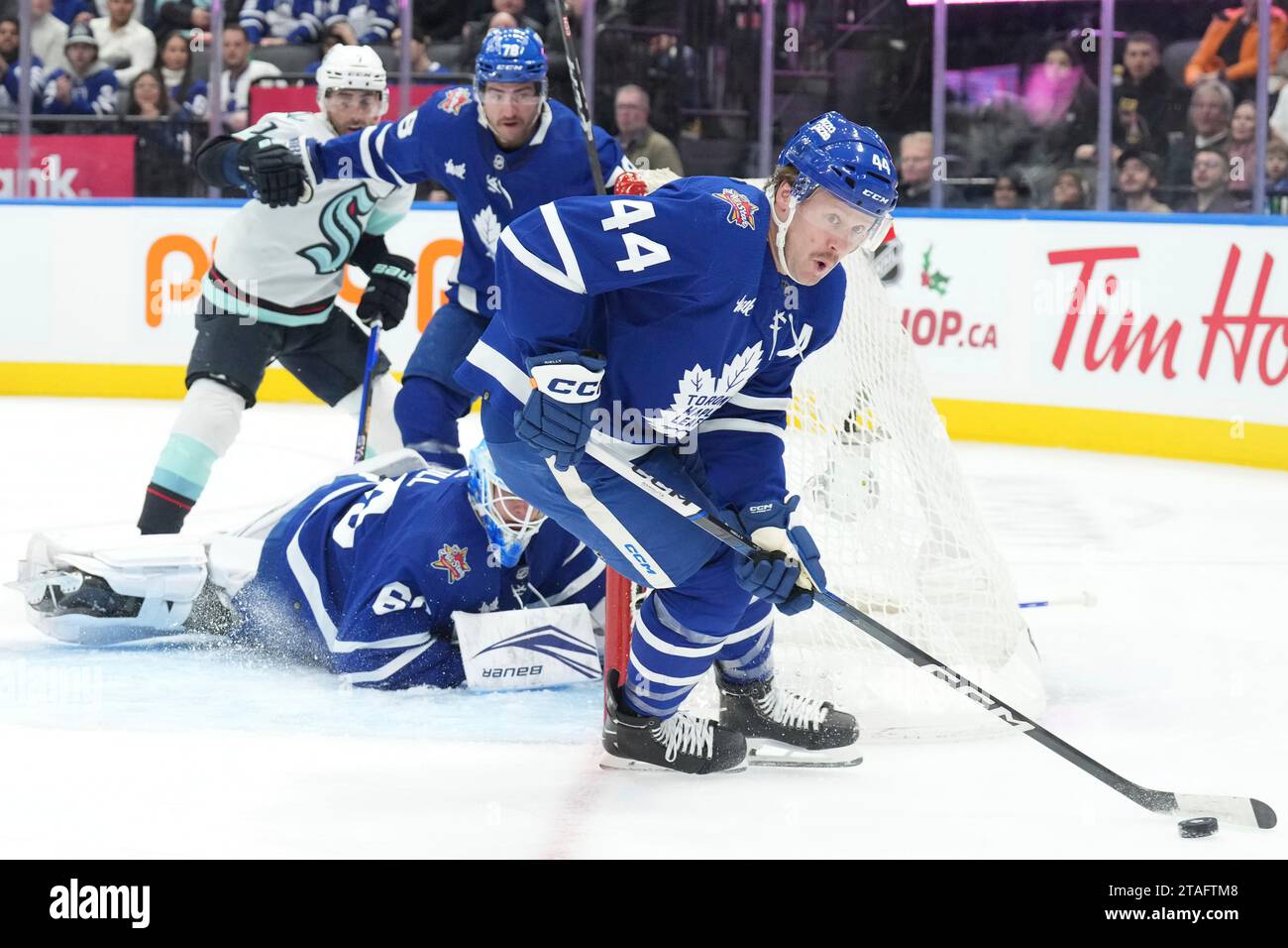 Toronto Maple Leafs' Morgan Rielly clears the puck away from goaltender ...