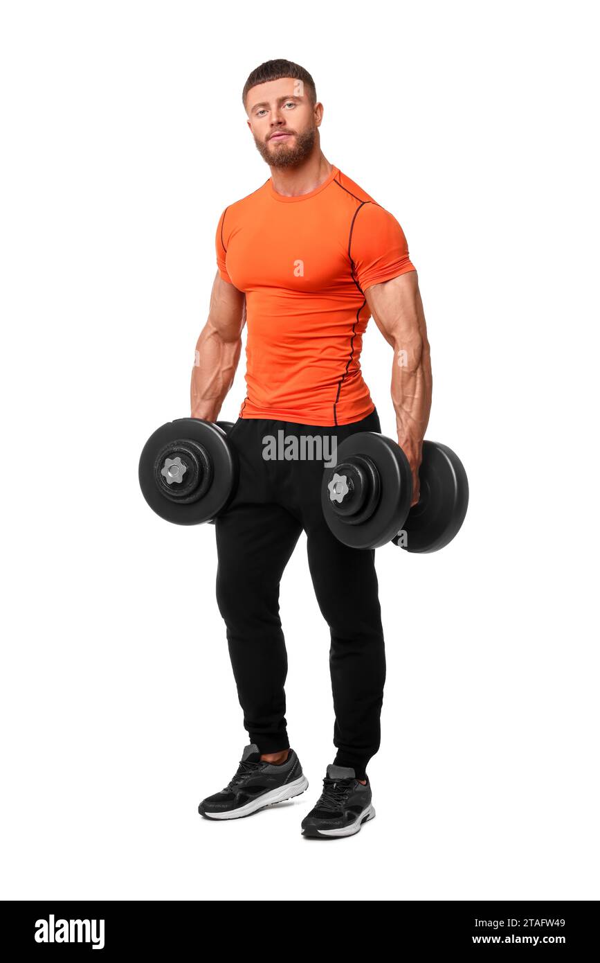 Young bodybuilder exercising with dumbbells on white background Stock ...