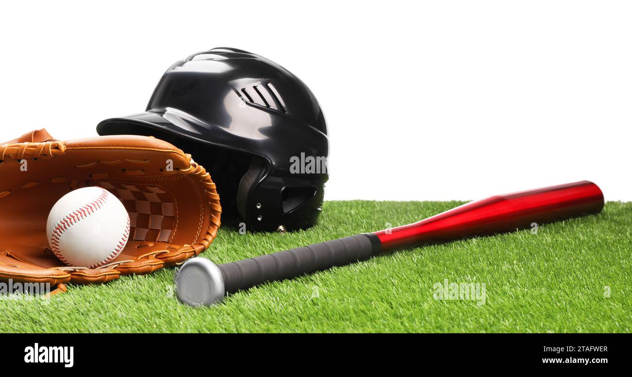 Baseball bat, ball, batting helmet and glove on artificial grass ...