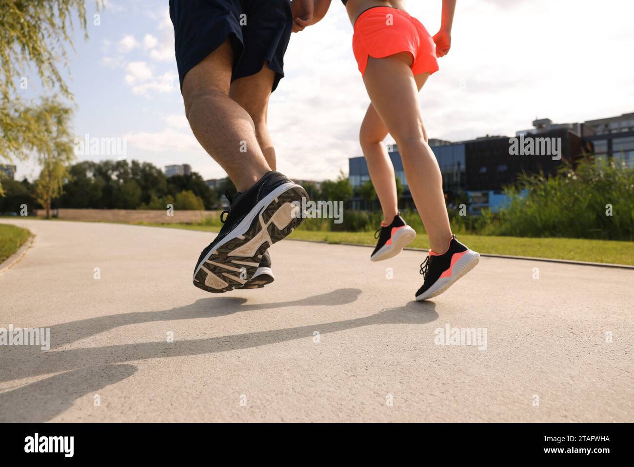 Woman run low angle feet hi-res stock photography and images - Alamy