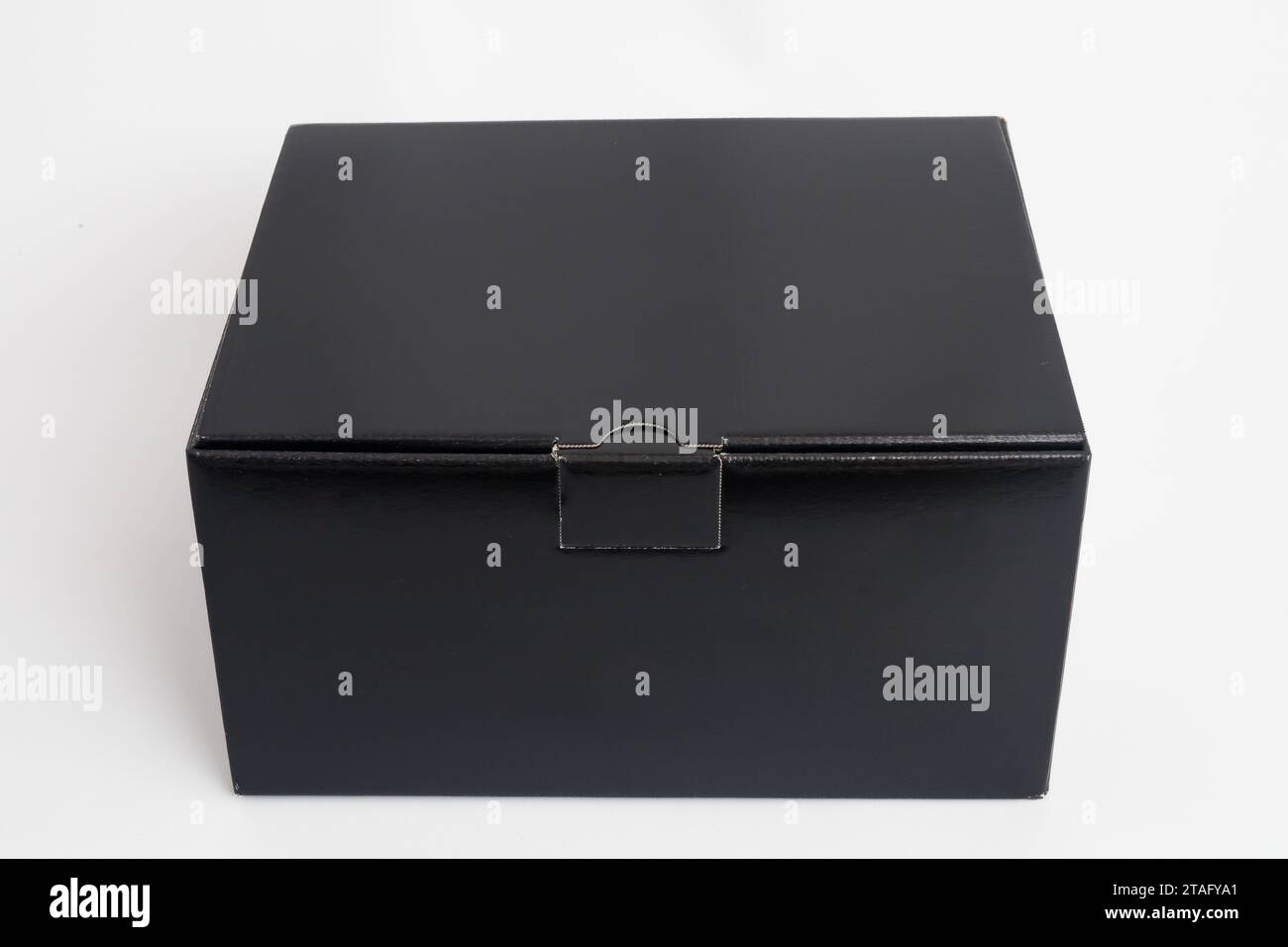 Black cardboard box on white background. upper front view Stock Photo ...