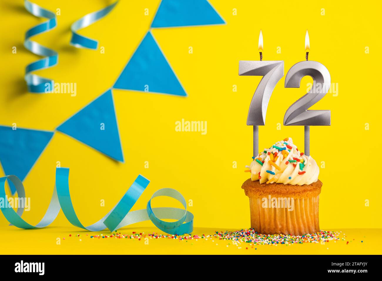 Birthday candle number 72 with cupcake - Yellow background with blue ...