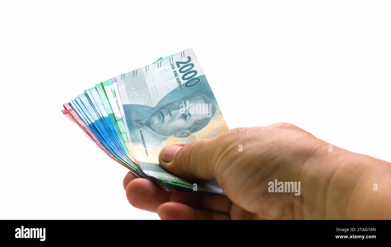 IDR Indonesian Rupiah is the official currency of Indonesia. Asian man ...