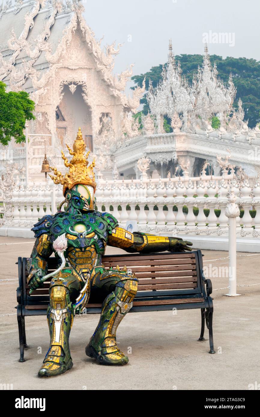 Chiang Rai,Thailand-March 29 2023: Seated on a bench next to the ...