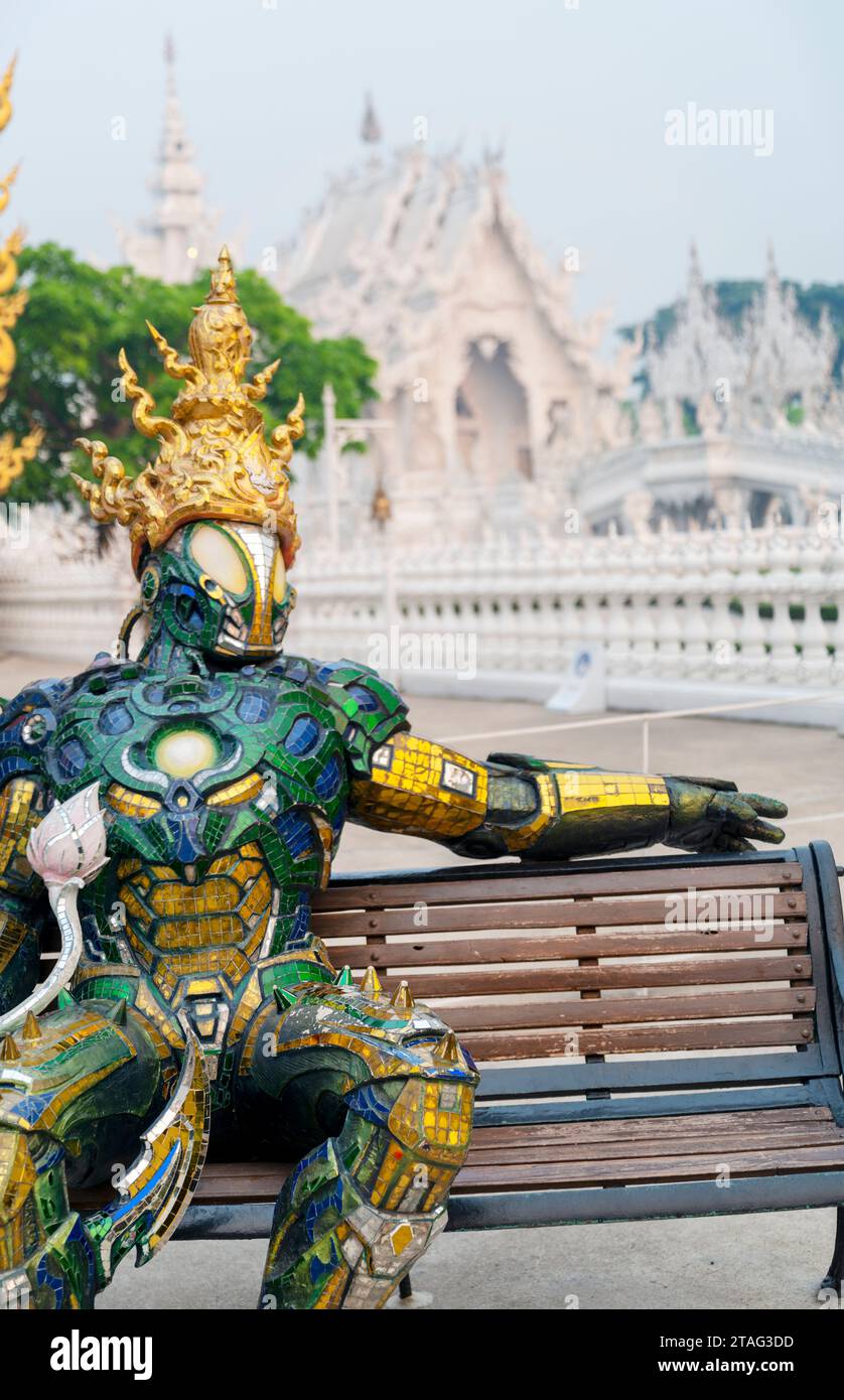 Chiang Rai,Thailand-March 29 2023: Seated on a bench next to the ...