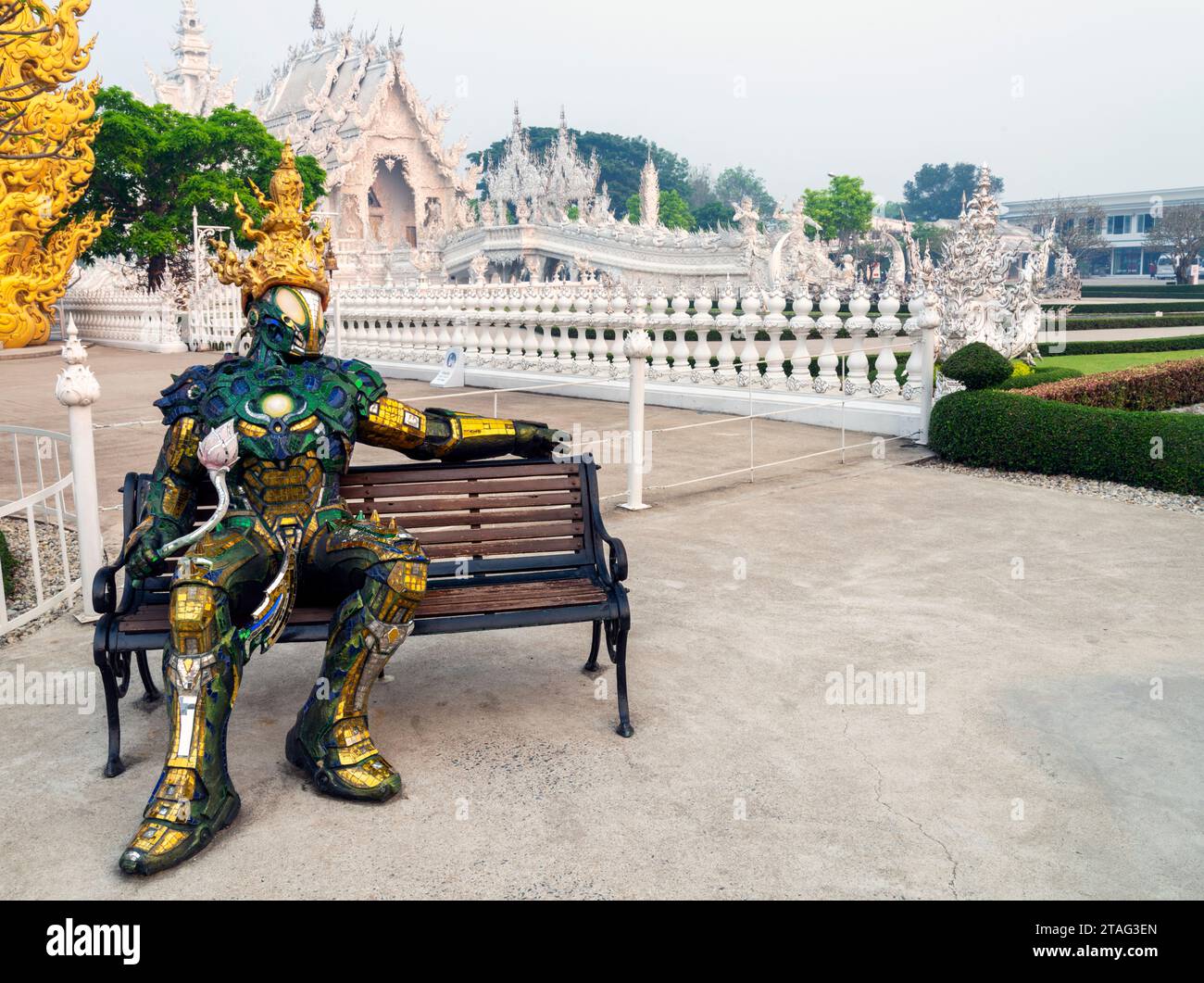 Chiang Rai,Thailand-March 29 2023: Seated on a bench next to the ...