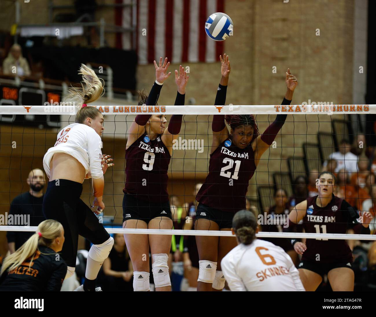 November 30, 2023: Texas A&M opposite Logan Lednicky (9) and middle blocker Morgan Perkins (21 ...