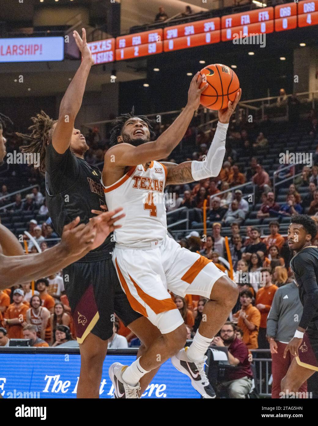 Texas, USA. 30th Nov, 2023. Tyrese Hunter #4 of the Texas Longhorns in ...