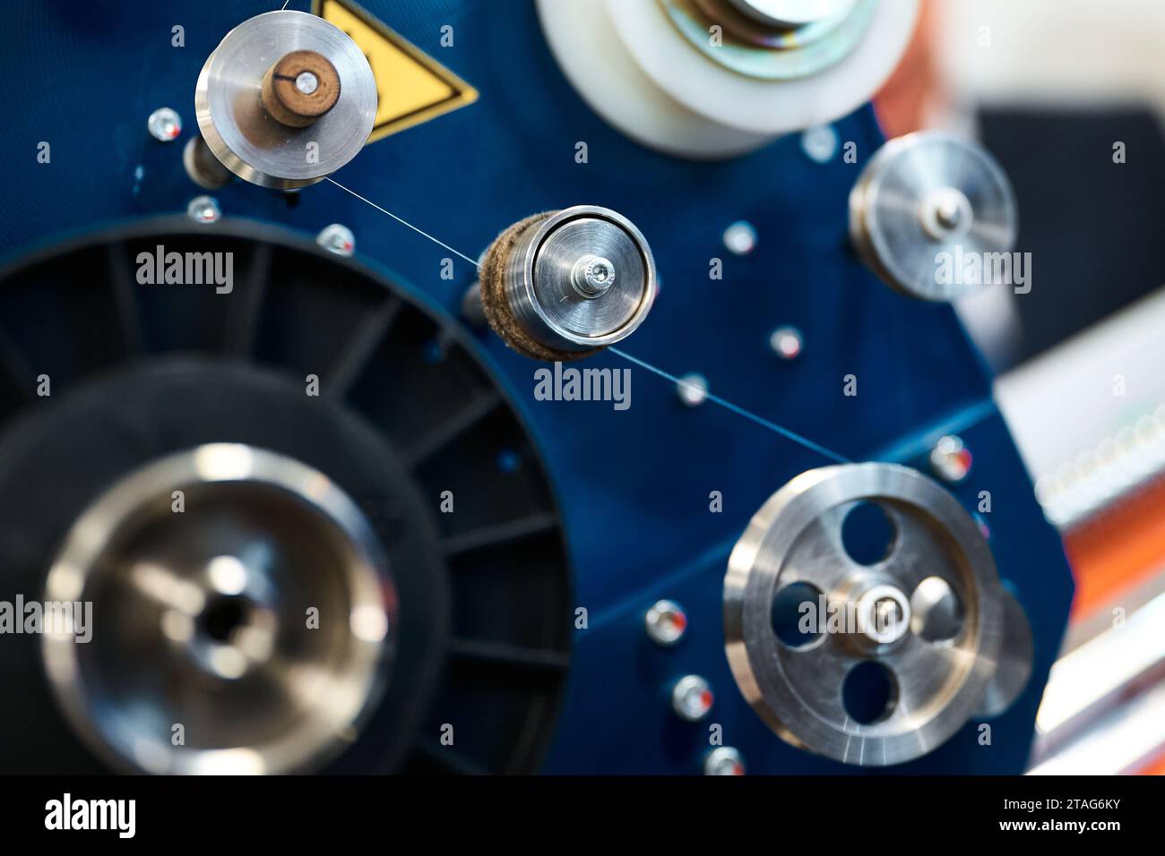 Wire feeding mechanism of electroerosive machine tool Stock Photo - Alamy