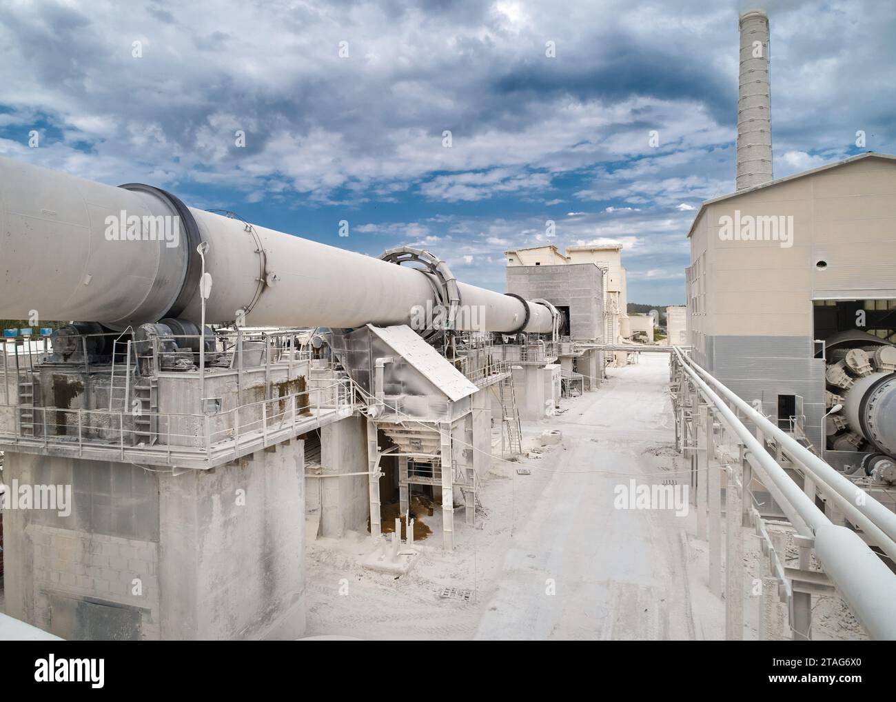 Limestone burning rotating furnace with large pipe at plant Stock Photo ...
