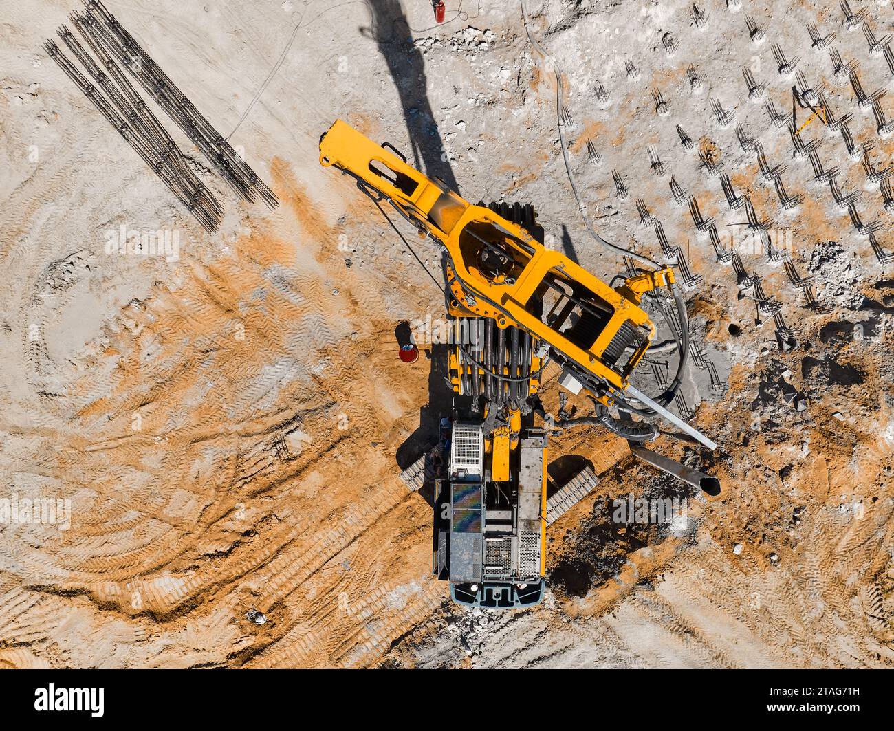 Yellow drilling rig for building high quality mine on site Stock Photo ...