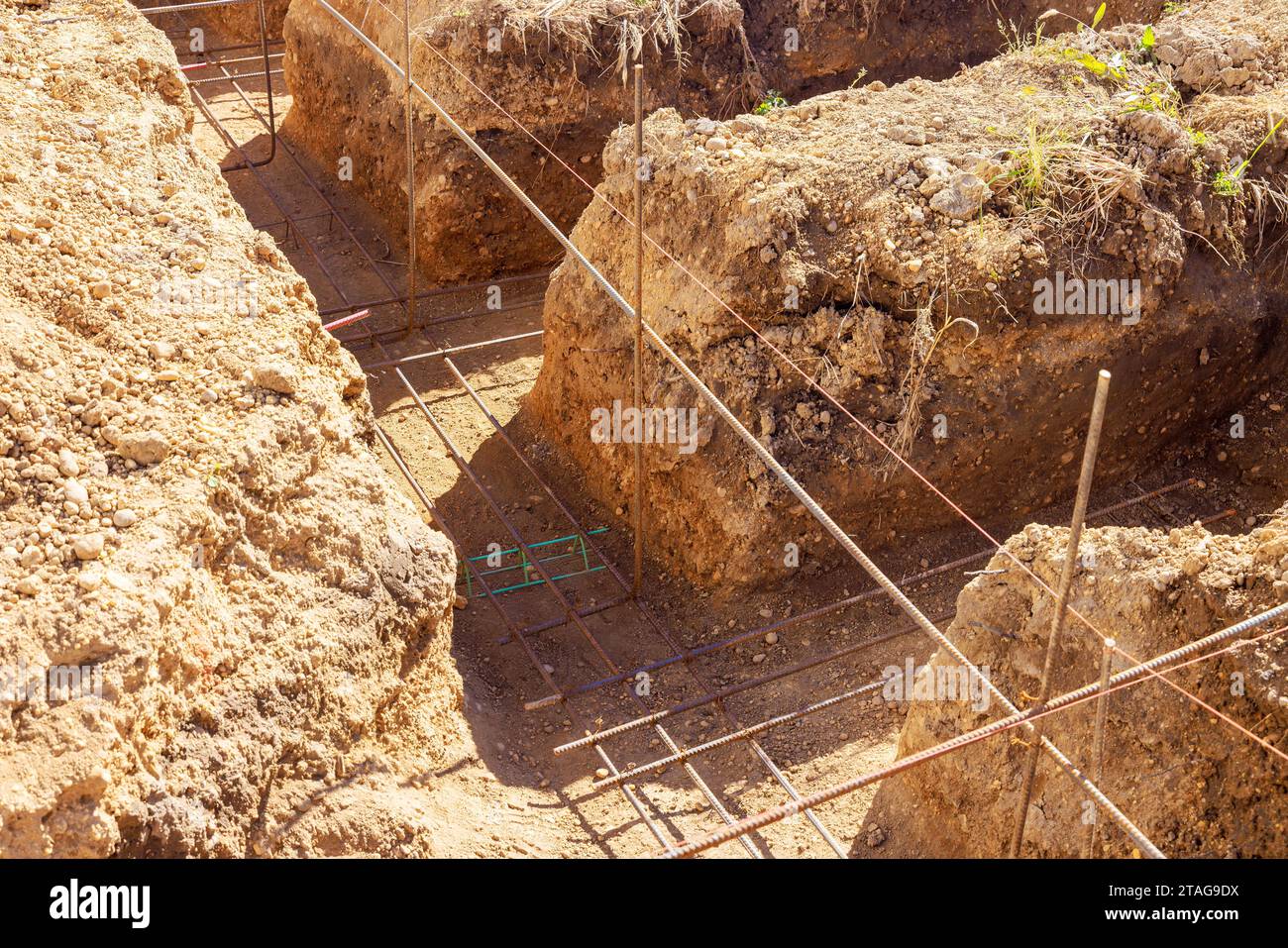 Constructing concrete foundation from digging an earthen trench Stock ...