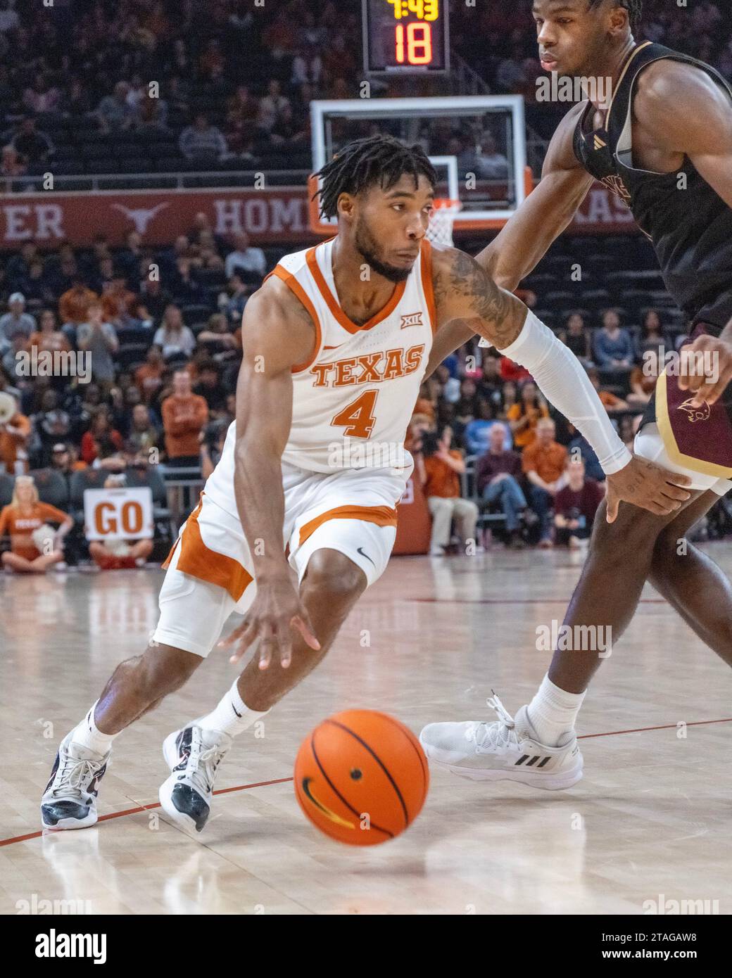 Texas, USA. 30th Nov, 2023. Tyrese Hunter #4 of the Texas Longhorns in ...