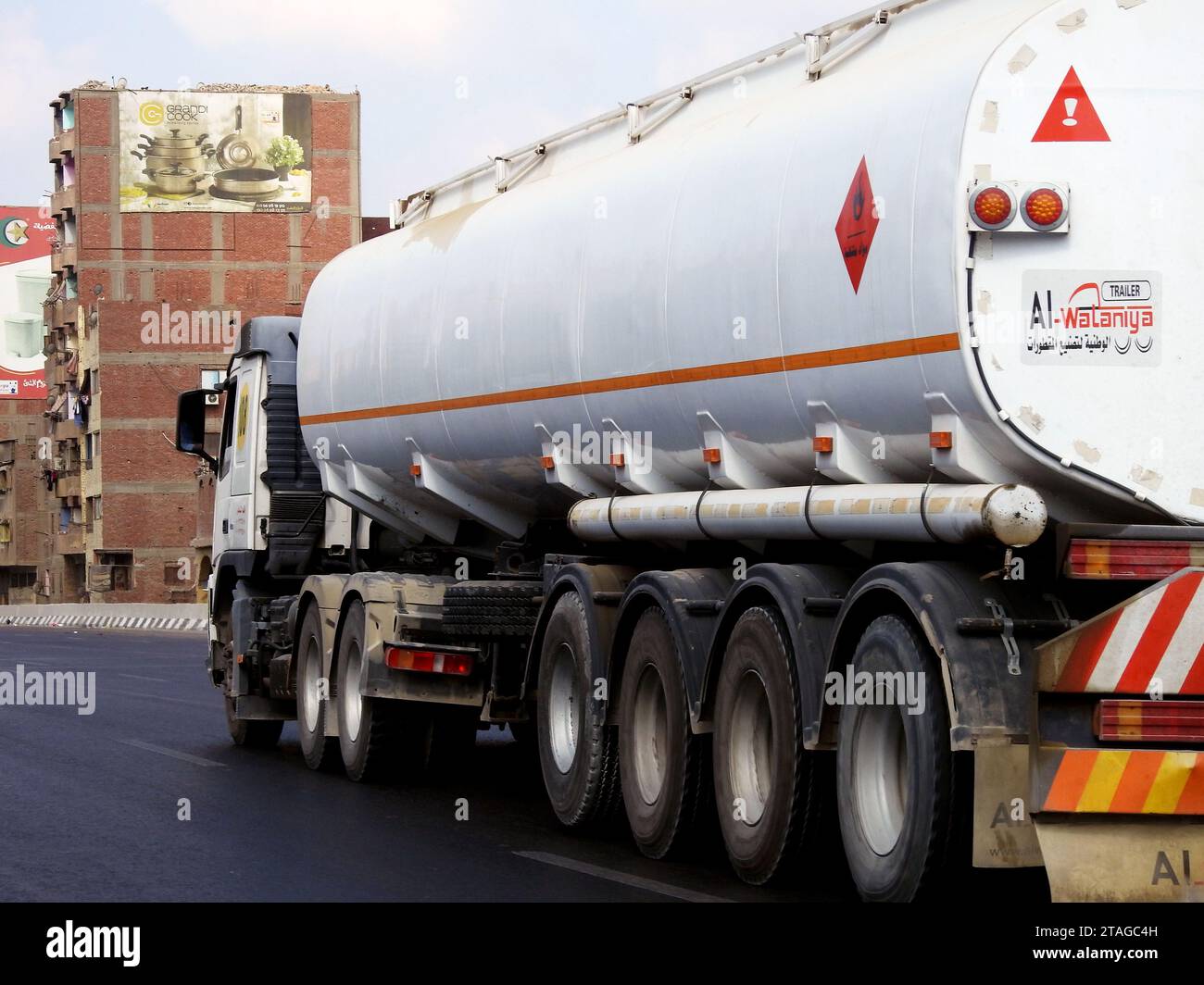 Giza, Egypt, September 9 2022: Tanker truck with a container tank with ...