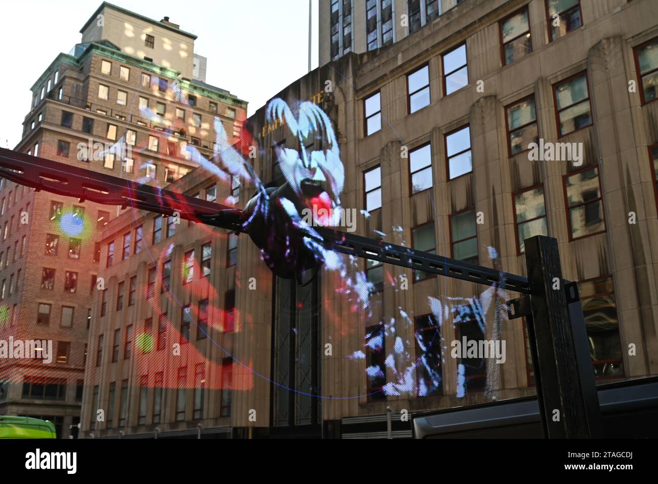 A digital light displays KISS signage outside the Empire State Building ...
