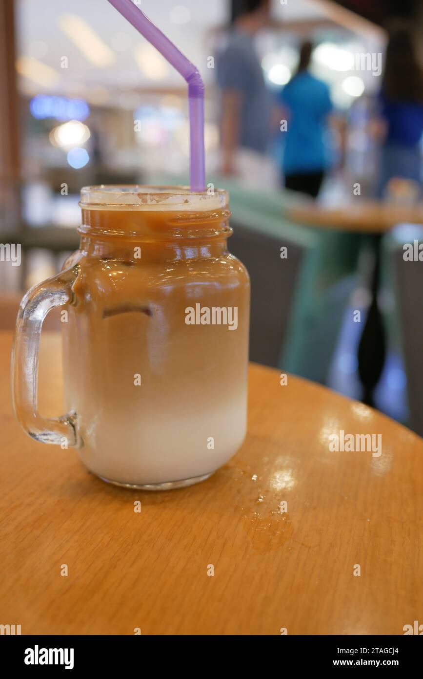 iced late in a transparent glass on cafe table outdoor Stock Photo - Alamy