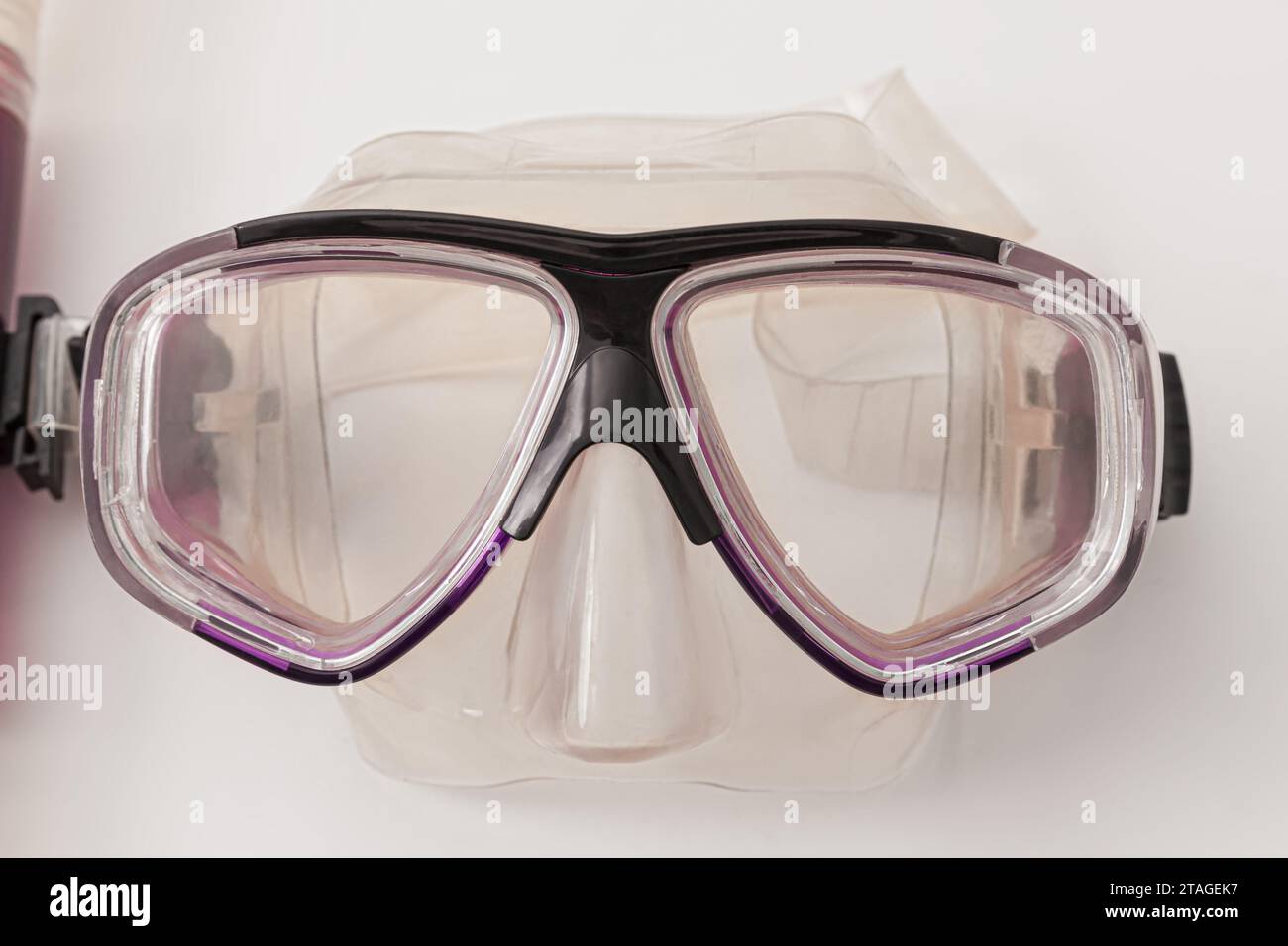 Purple plastic diving and snorkeling mask isolated on white background ...