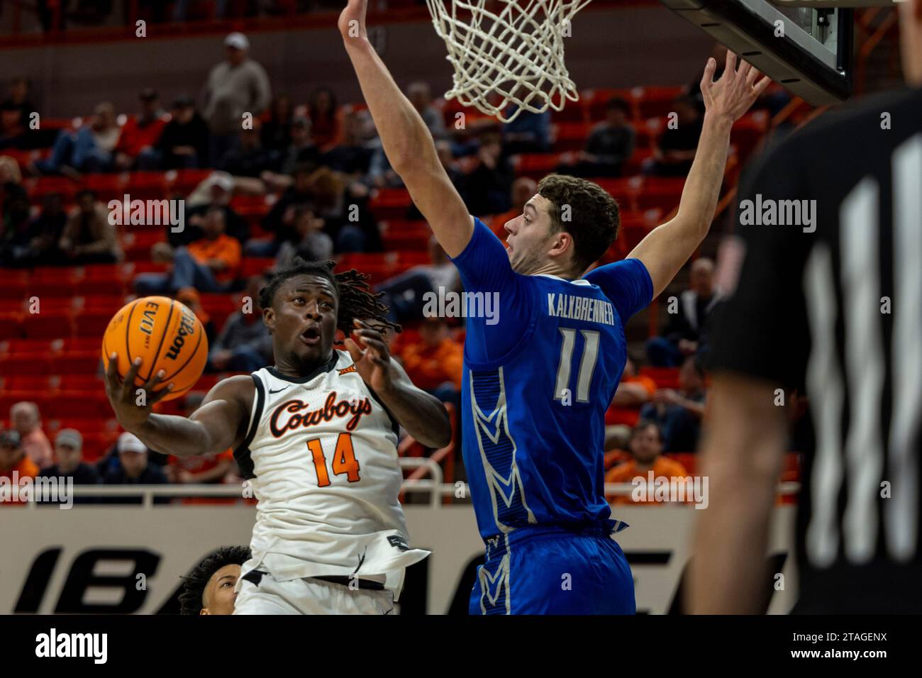 Oklahoma State guard Jamyron Keller (14) shoots around Creighton center ...