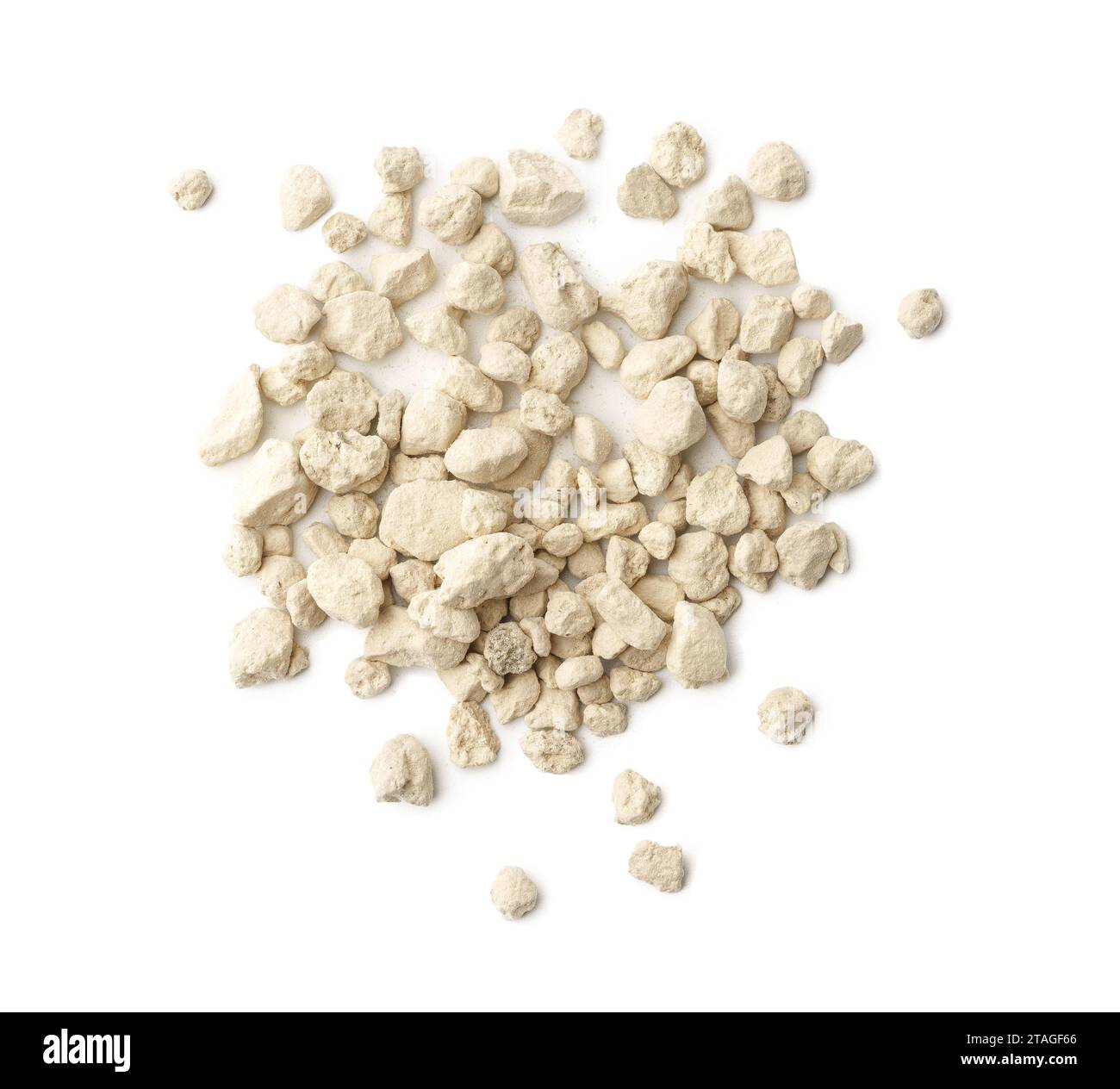 Mineral cat litter filler on white background Stock Photo - Alamy