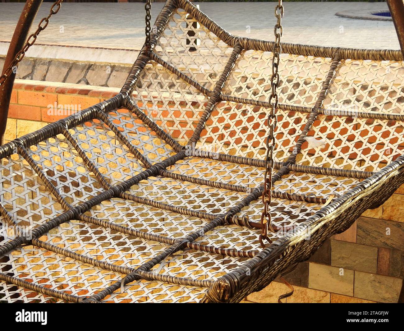 A garden swing hammock metal bed, a sling made of fabric, metal and ...