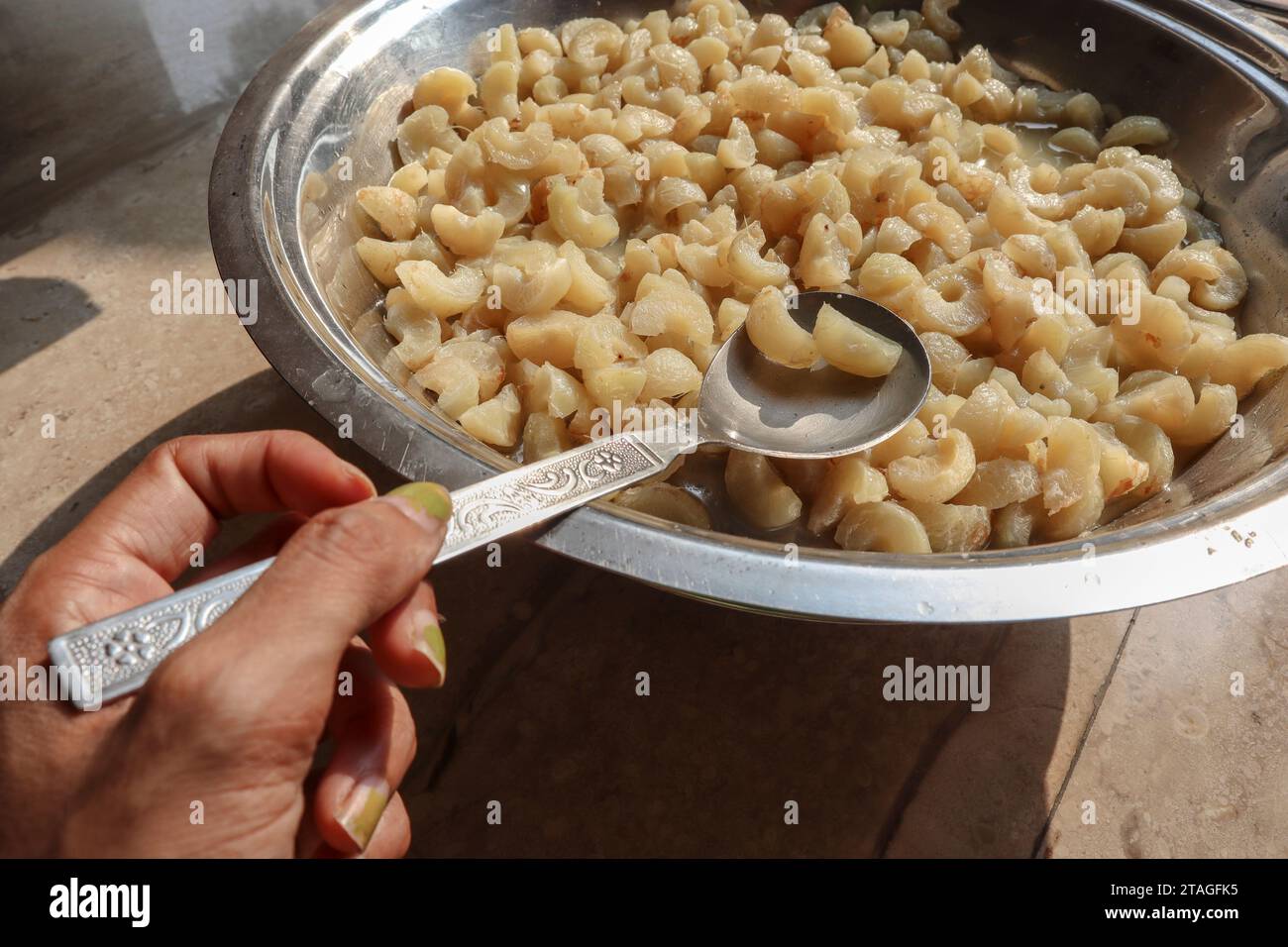 Homemade Amla candy. dried and sugar dipped Indian gooseberry fruit cut ...