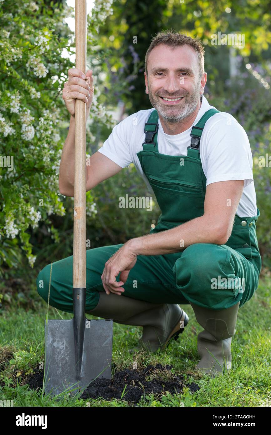Worker digs soil shovel hi-res stock photography and images - Alamy