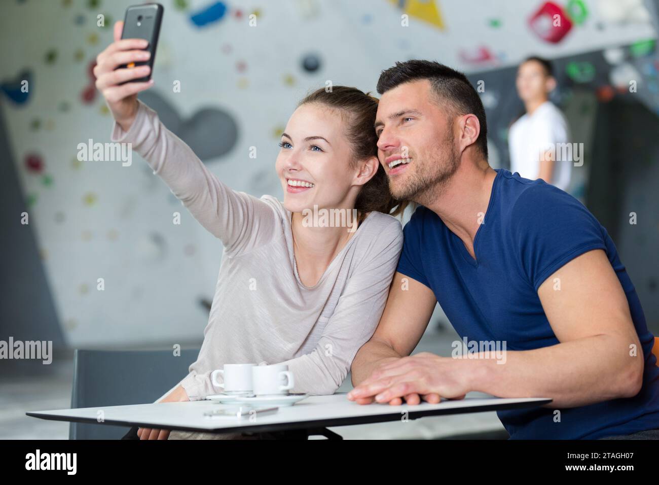couple in activity center cafe taking a selfie Stock Photo - Alamy