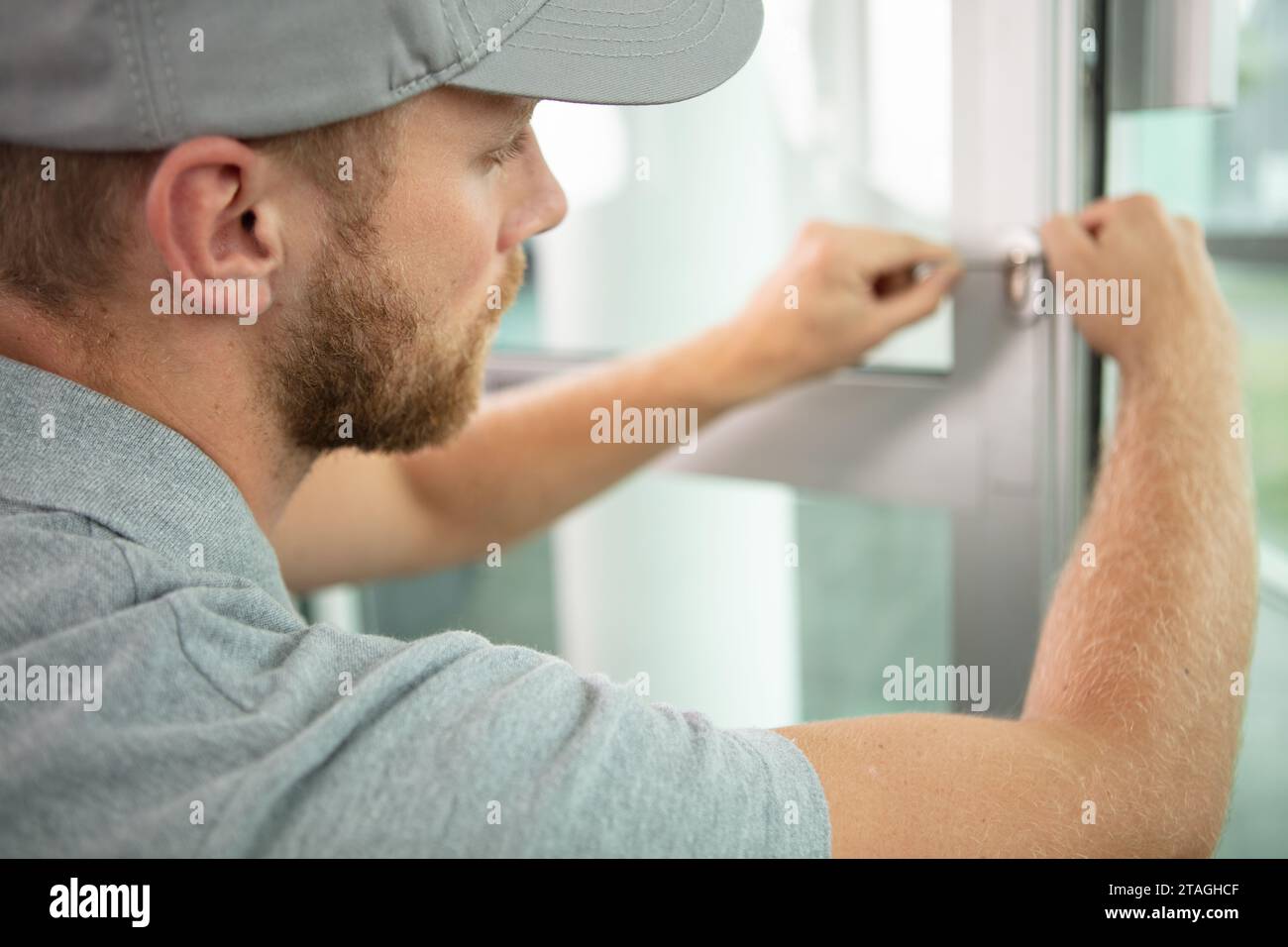 Installing lock on door hi-res stock photography and images - Alamy