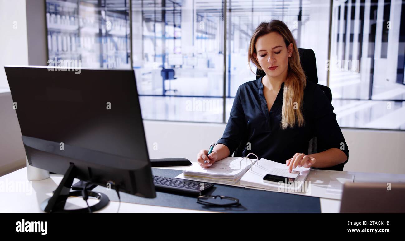 Accountant Using E Invoice Software At Computer In Office Stock Photo ...