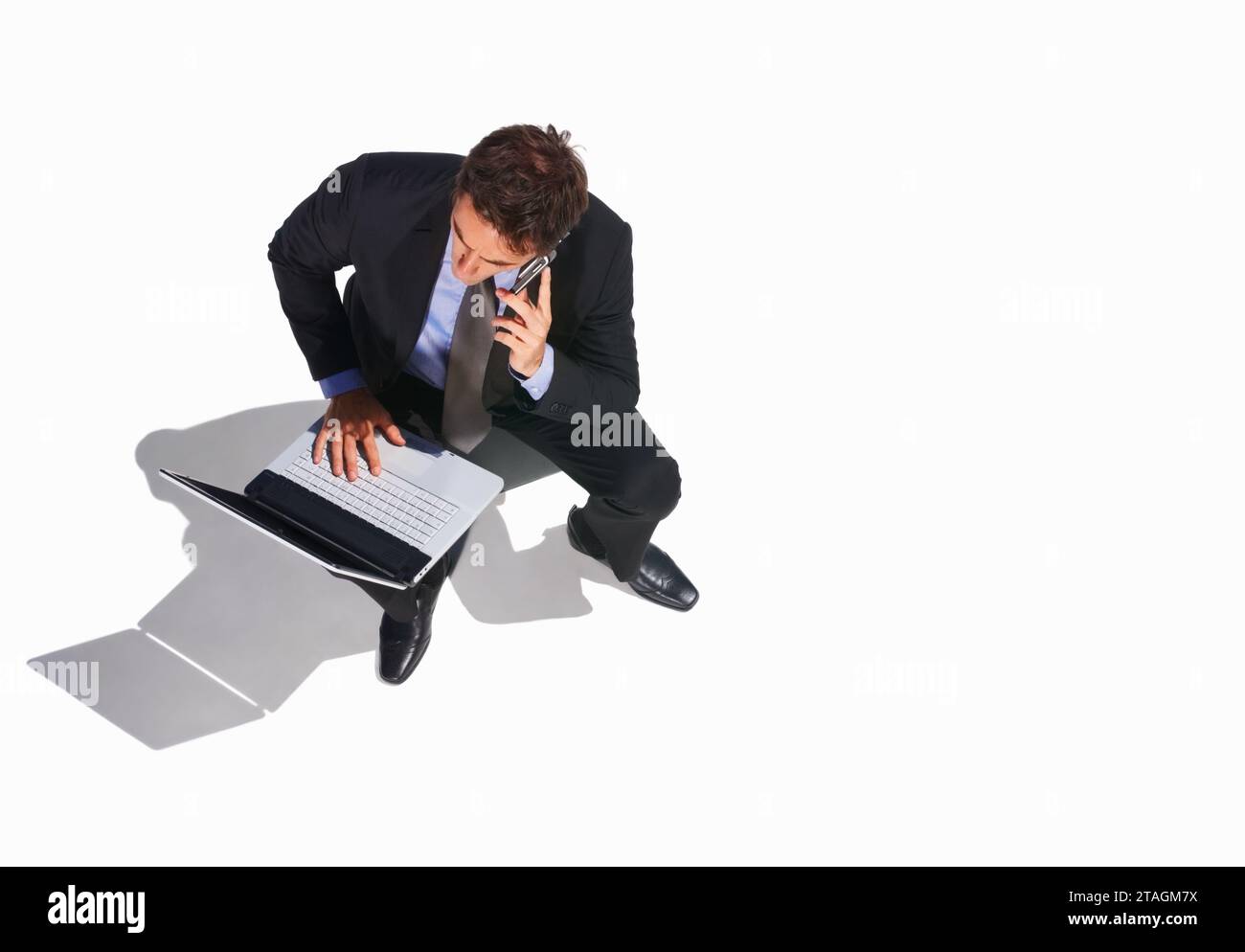 Business man, phone call and top view of laptop, listen to conversation ...