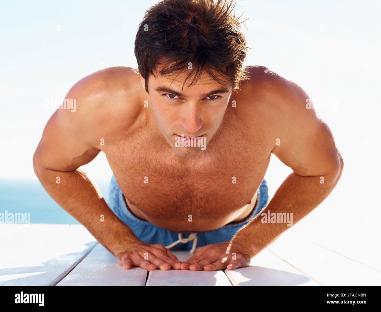 Young man, push up and portrait with training for health body, fitness ...