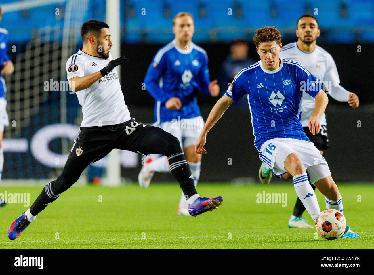 Molde 20231130.Molde's Emil Breivik (right) and Elvin Jafarguliyev ...