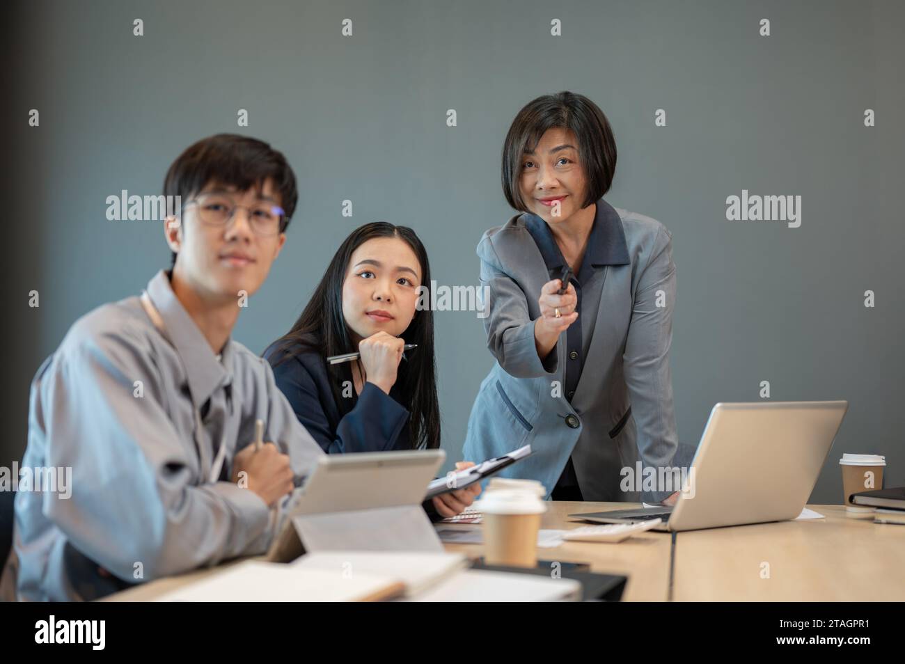 Female ceo boardroom table hi-res stock photography and images - Alamy