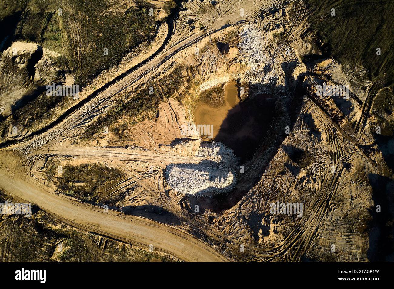 Aerial view of a pit dug in a quarry for the extraction of crushed ...