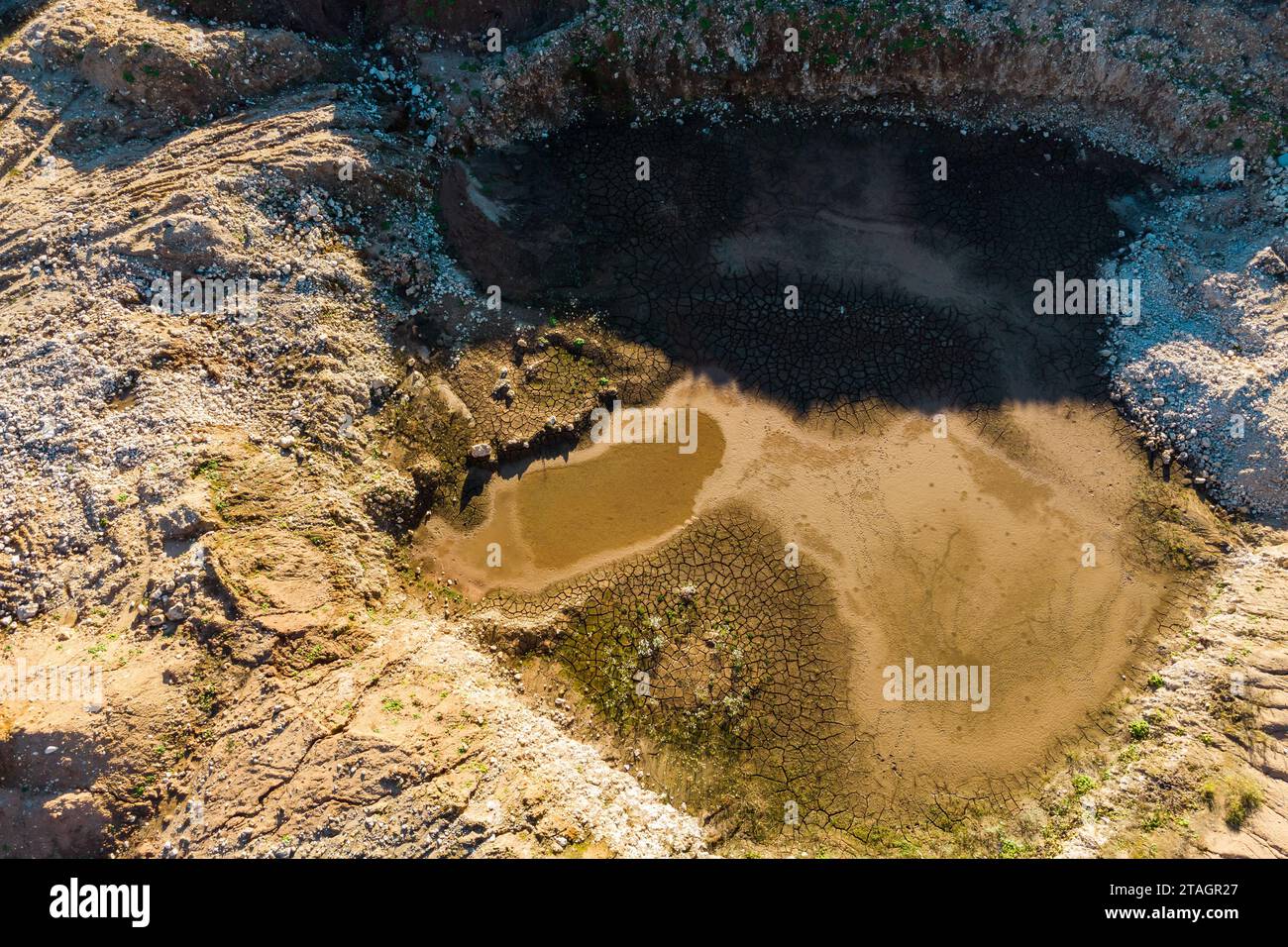 Aerial view of a pit dug in a quarry for the extraction of crushed ...