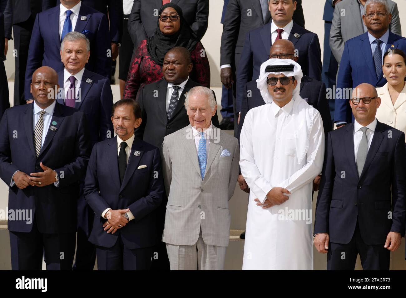 King Charles III, center, attends a group photo at the COP28 U.N ...