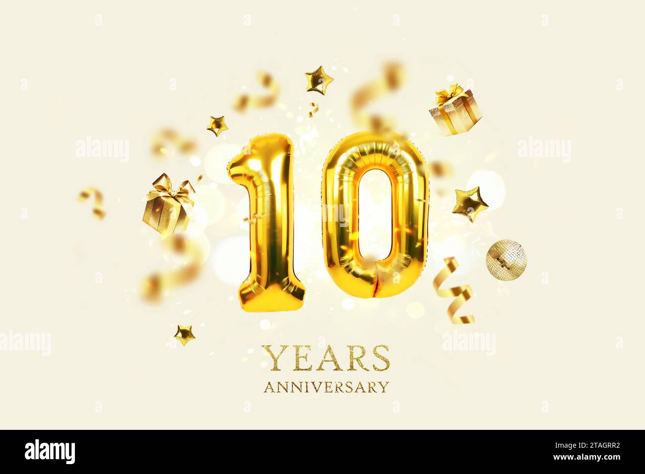 Gold festive balloons 10 years anniversary with golden confetti ...