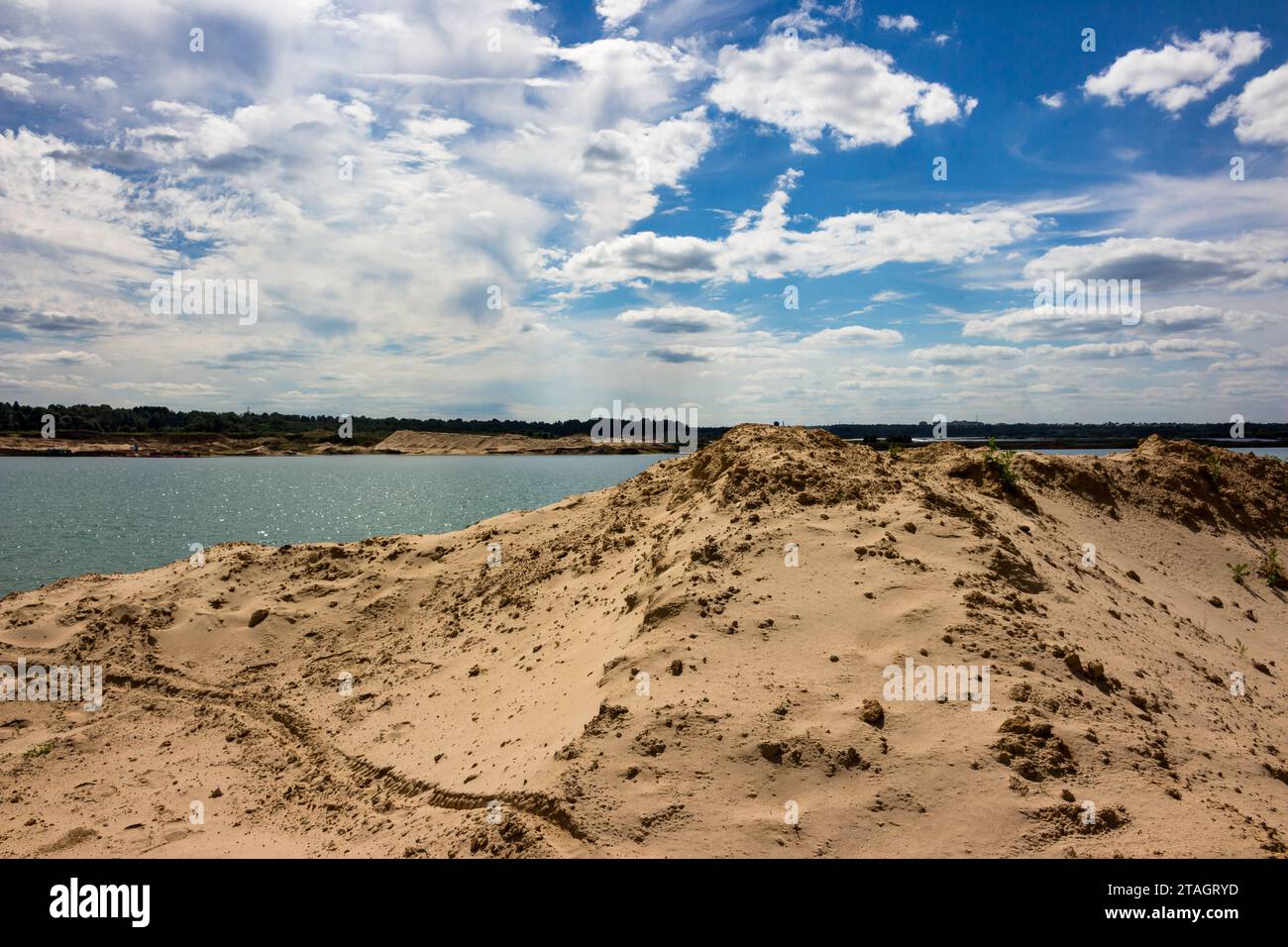Sandy shore of a reservoir on the site of a former sand quarry Stock ...
