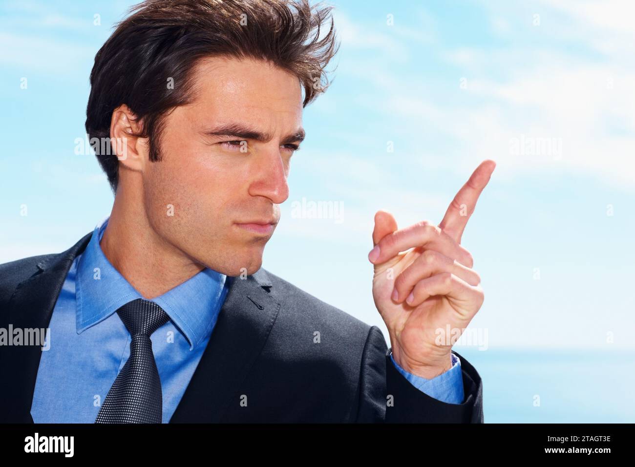 Face, pointing and a business man on a blue sky background planning ...