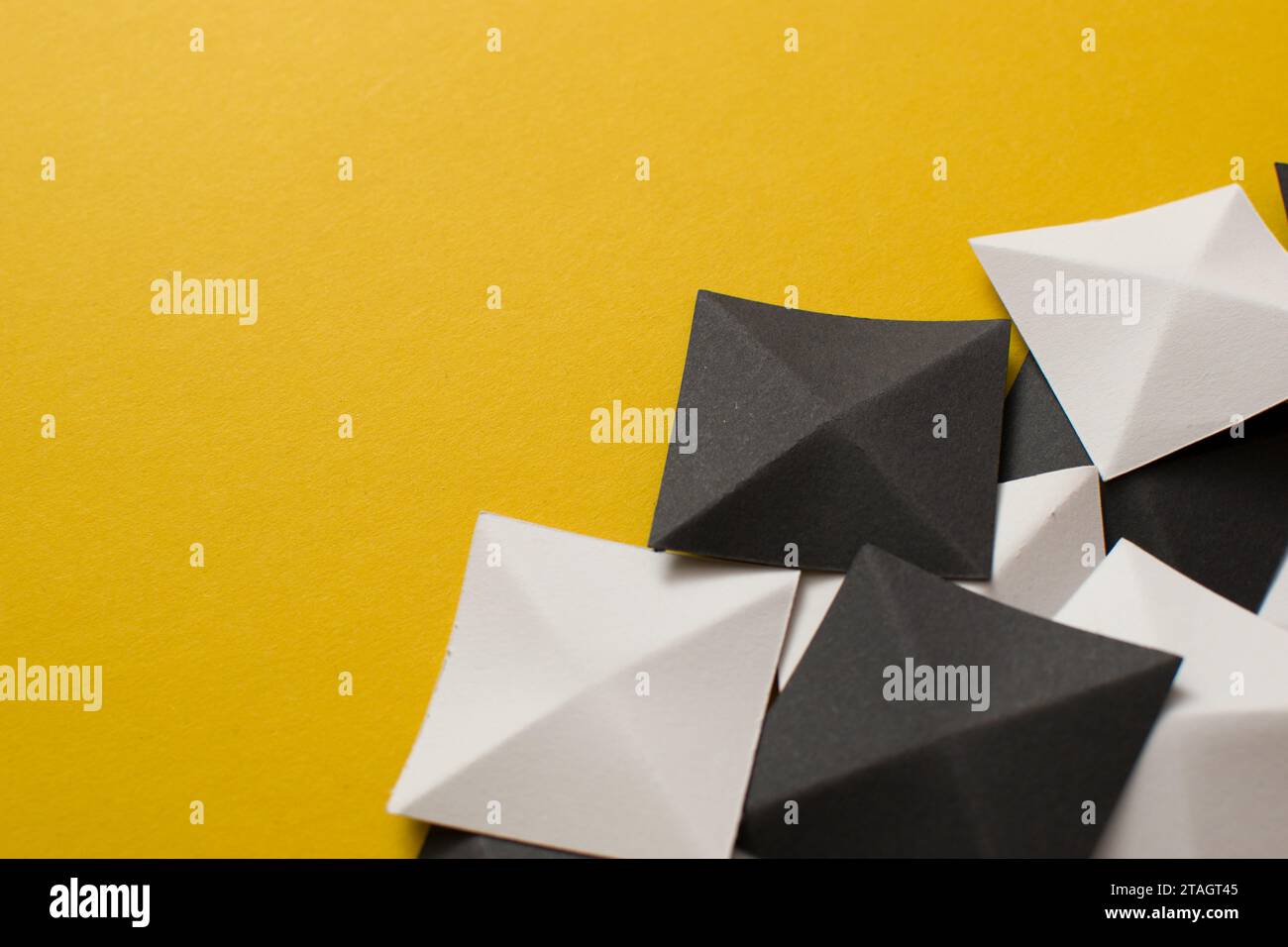 Black and white 3d shapes on yellow background Stock Photo - Alamy