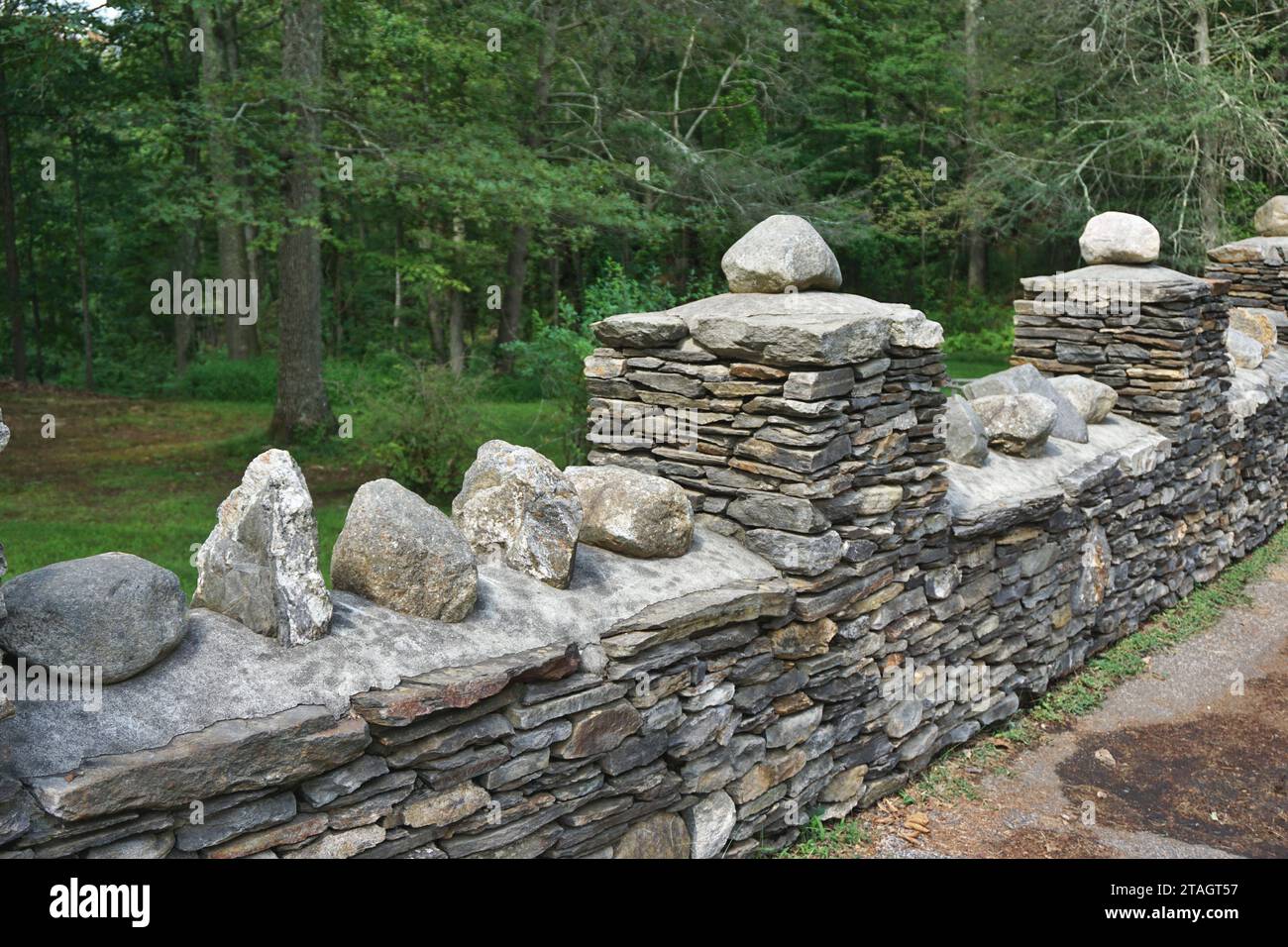 Dry stone fence capped with mortar and larger rocks in Gillette Castle ...