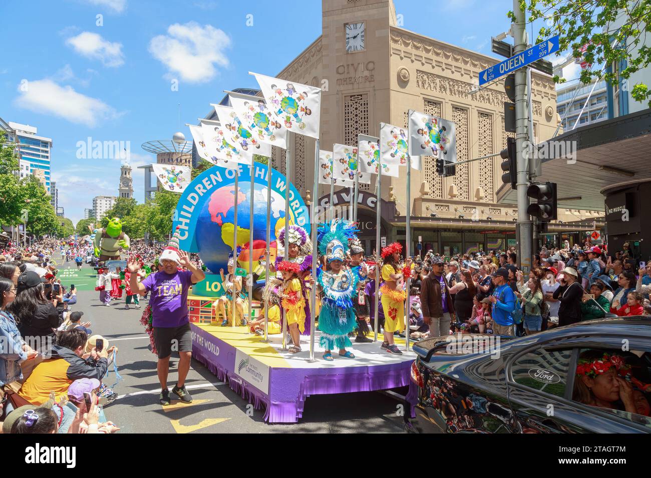 A "Children of the World" float taking part in the Farmers Christmas ...
