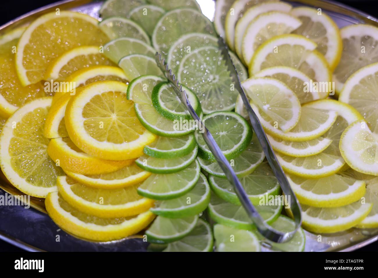 Closeup plate limes lemons hi-res stock photography and images - Alamy