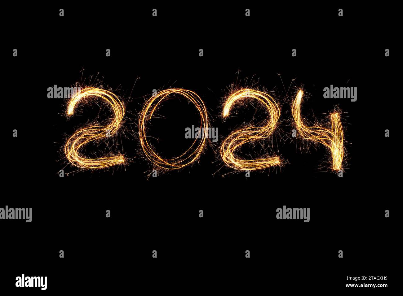 New Year 2024 light. Sparklers draw figures 2024. Bengal lights and ...