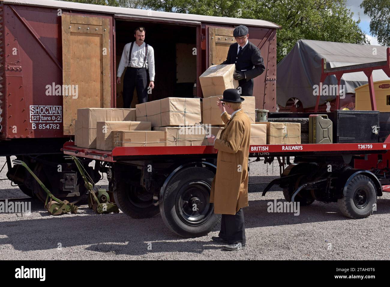 1960's re-enactors demonstrating loading goods trains at Quorn Station ...