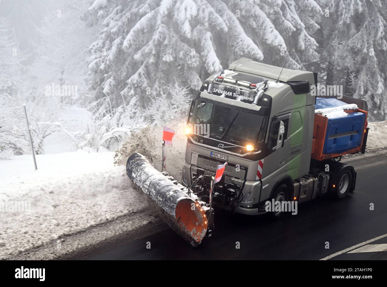 Oberhof, Germany. 01st Dec, 2023. A snow plow drives on the road ...