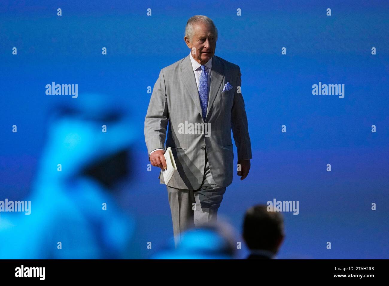 Britain's King Charles III walks through the opening during an opening ...