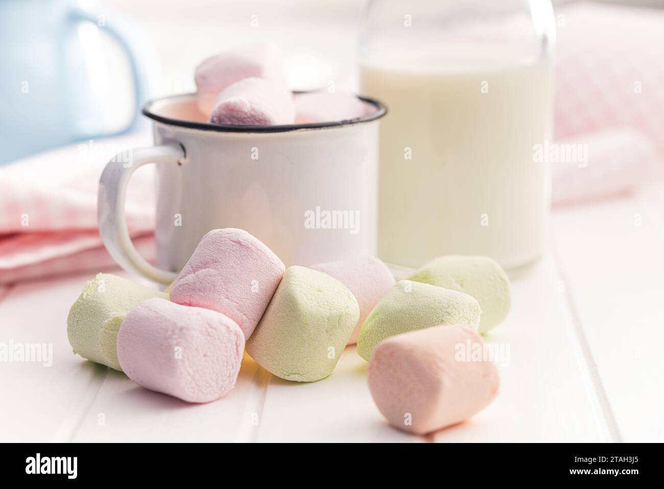 Sweet marshmallows candy on the kitchen table Stock Photo - Alamy