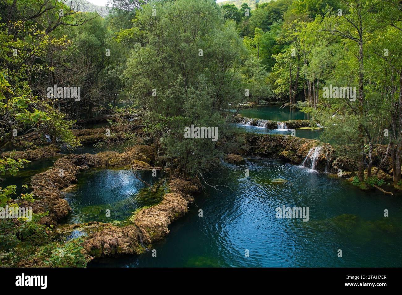 Travertine pools in the River Una at the Small Waterfalls at Martin ...